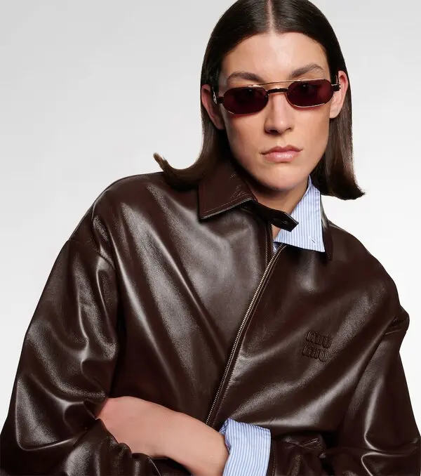 Miu Miu Oval Sunglasses - Gold