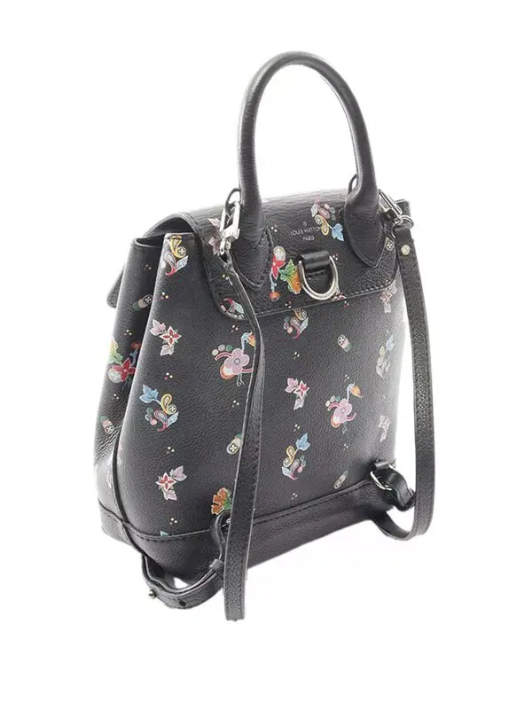 LOUIS VUITTON Taurillon Lockme Backpack
