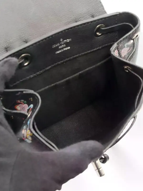 LOUIS VUITTON Taurillon Lockme Backpack