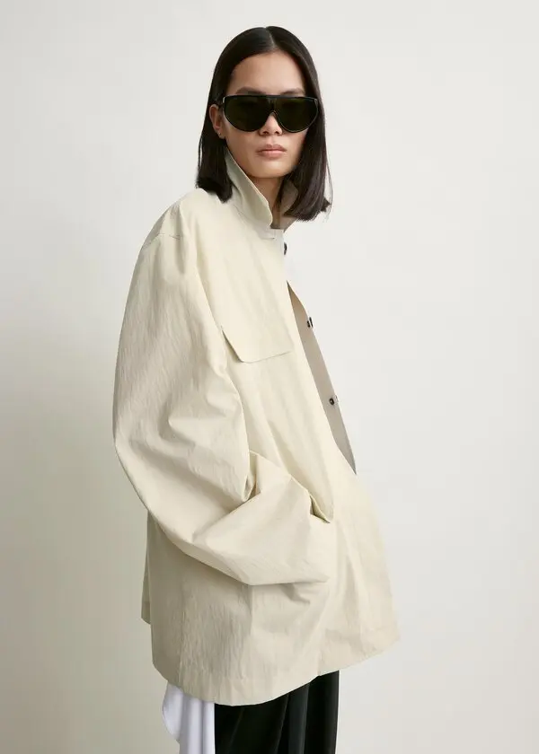 TOTEME Oversized Cotton Twill Utility Jacket With Drawstring - Creme