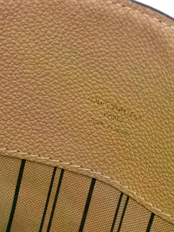 LOUIS VUITTON Bagatelle Monogram Empreinte Leather Hobo Bag - Neutrals