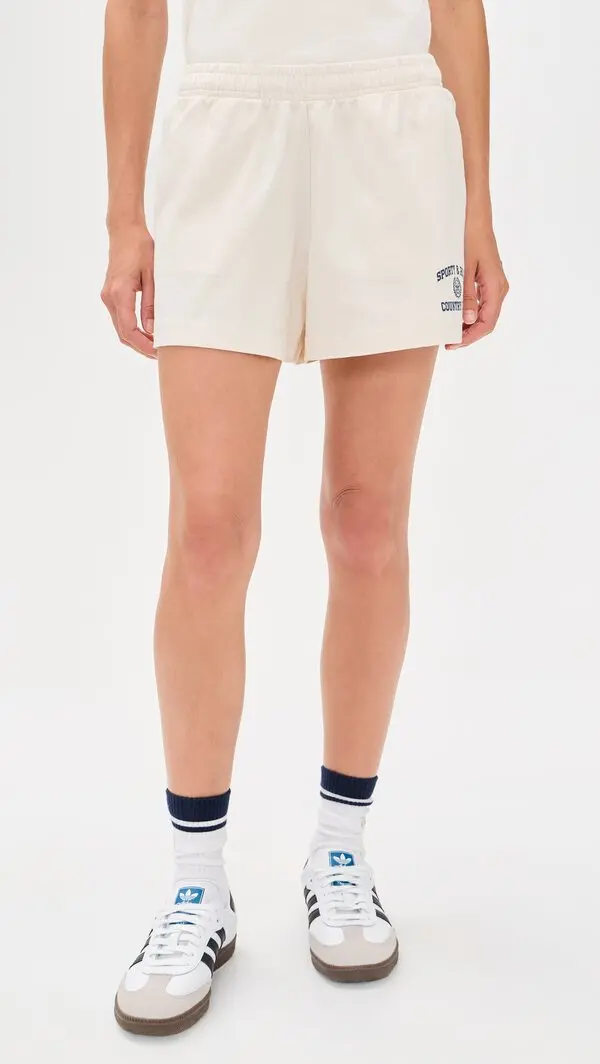 SPORTY & RICH Varsity Crest Disco Shorts - Ecru