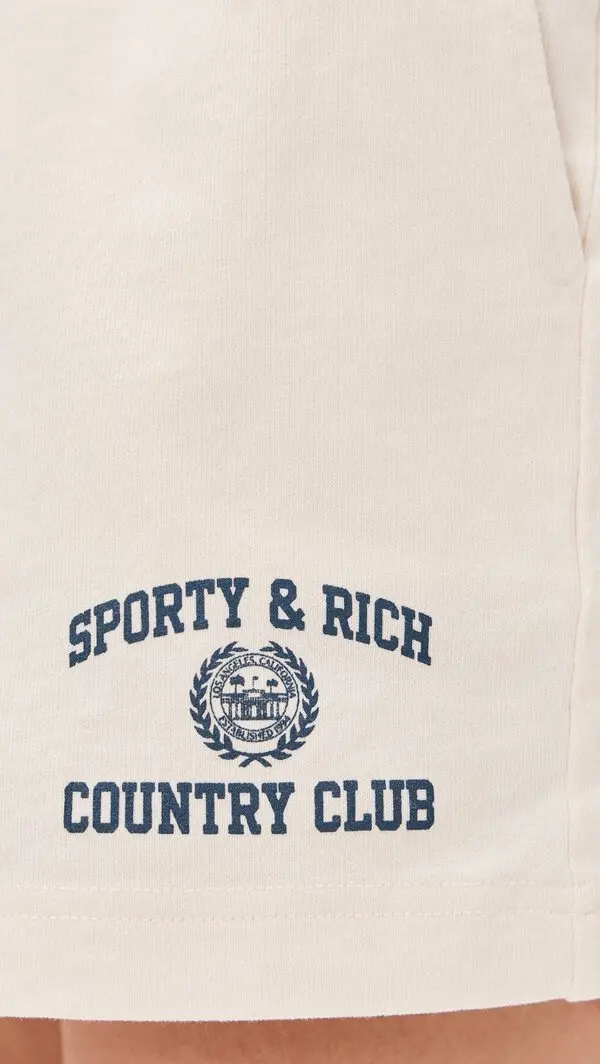 SPORTY & RICH Varsity Crest Disco Shorts - Ecru
