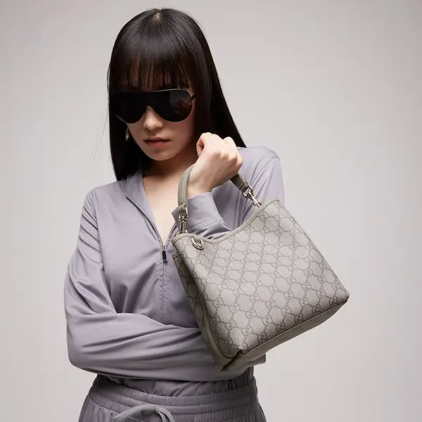 Gucci Gg Emblem Small Bucket Bag In Monogram Coated Fabric - Grey