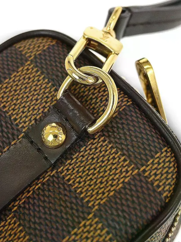 LOUIS VUITTON Etui Okapi Crossbody Bag