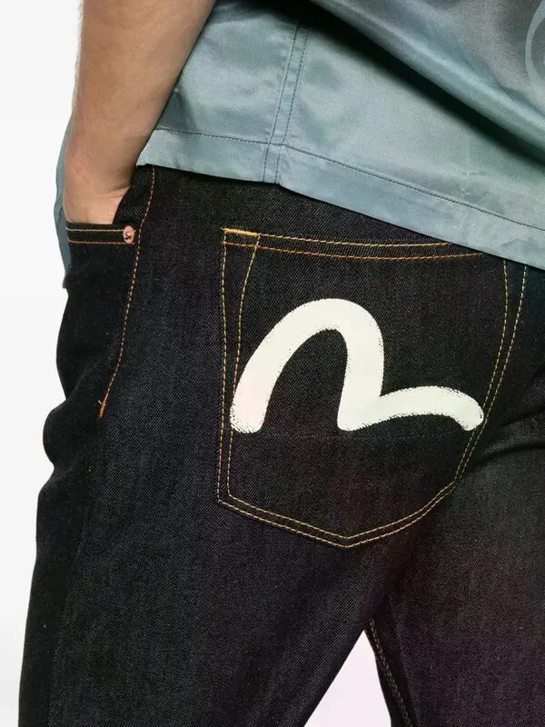 EVISU Logo Print Jeans
