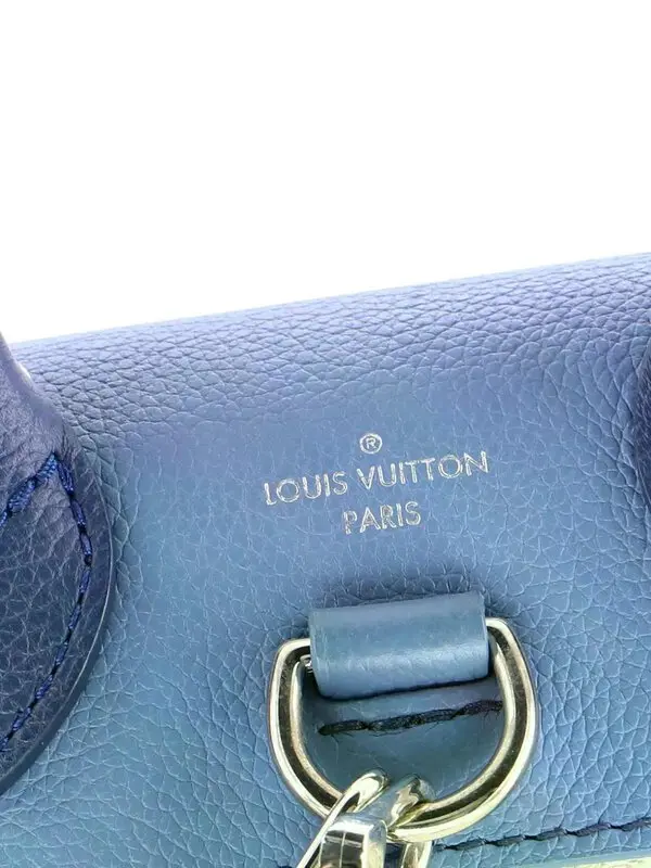 LOUIS VUITTON Lockme Leather Mini Backpack