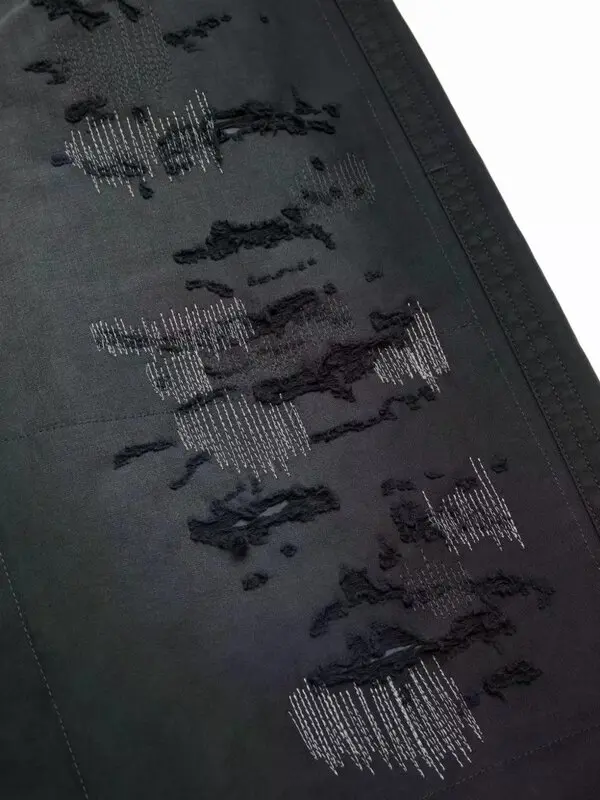 Acne Studios Mended Distressed Trousers