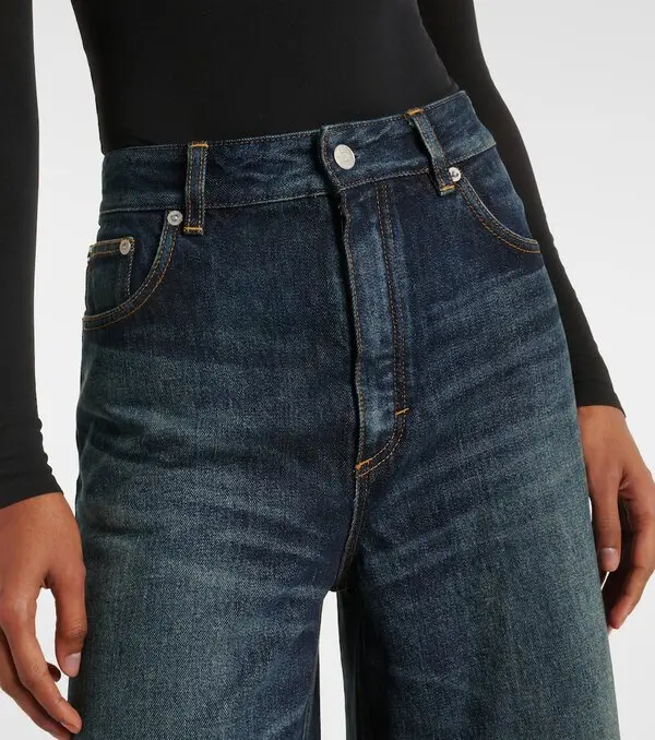 Alaïa Wide-leg Faded Jeans