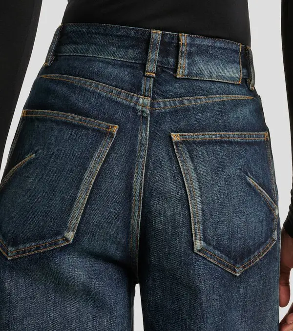 Alaïa Wide-leg Faded Jeans