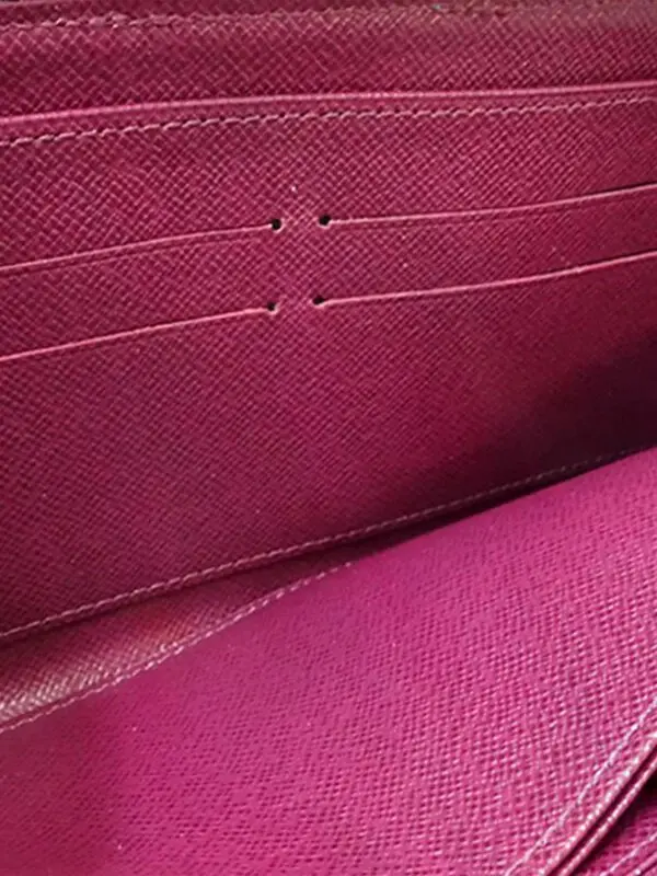 LOUIS VUITTON 2015 Monogram Totem Zippy Wallet Long Wallets