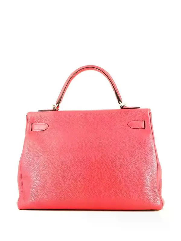 Hermès Kelly 32 Retourne Handbag In Salmon Togo Leather - Pink