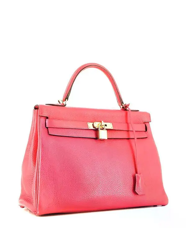 Hermès Kelly 32 Retourne Handbag In Salmon Togo Leather - Pink