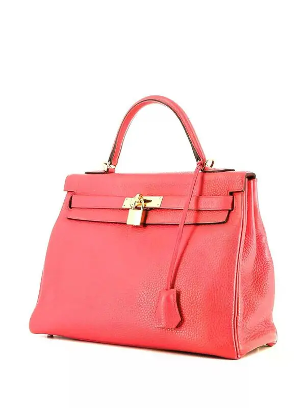 Hermès Kelly 32 Retourne Handbag In Salmon Togo Leather - Pink