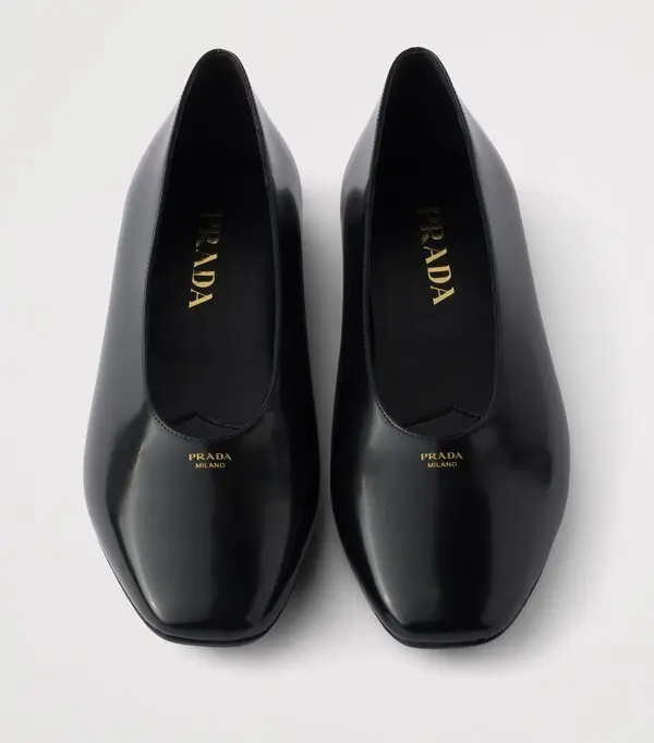 Prada Leather Ballet Flats With Gold Tone Logo Detail - Black