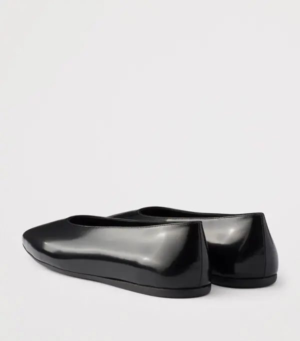 Prada Leather Ballet Flats With Gold Tone Logo Detail - Black