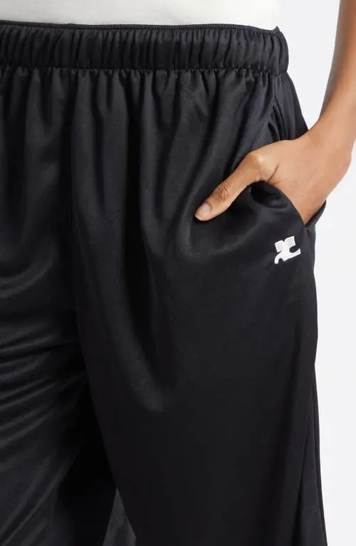 COURREGES Jersey Bermuda Shorts With Skirt Effect Back Panel