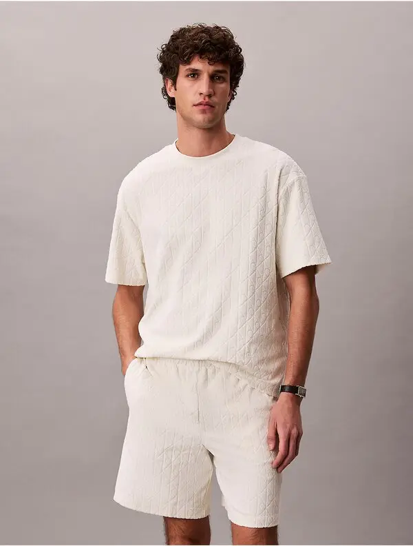 Calvin Klein Terry Allover Embossed Emblem Logo Relaxed T-shirt - Tofu