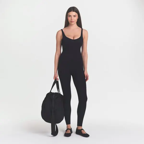 SKIMS 29" One Piece | Black | | Nike Studio Stretch - Obsidian