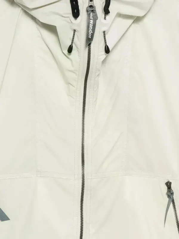 AND WANDER Pertex Hooded Jacket