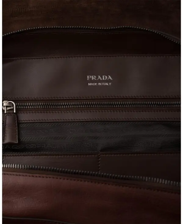 Prada Leather Buckled Flap Backpack