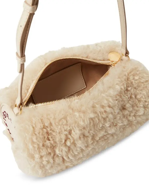 Stella McCartney Logo Faux Shearling Pouch Bracelet