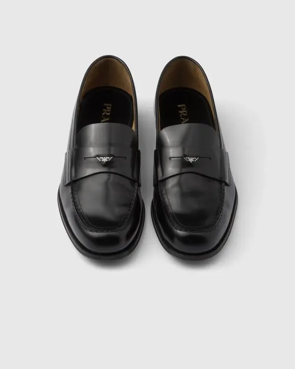 Prada Brushed Leather Loafers With Enameled Metal Triangle Logo