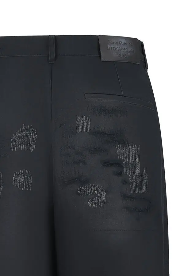 Acne Studios Mended Distressed Wide Leg Trousers