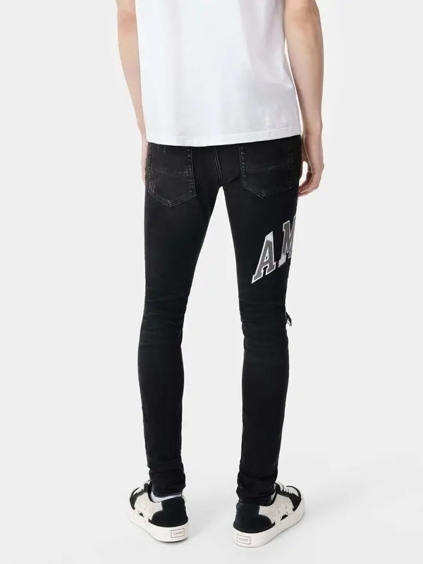 Amiri Logo Patch Distressed Skinny Jeans - Black