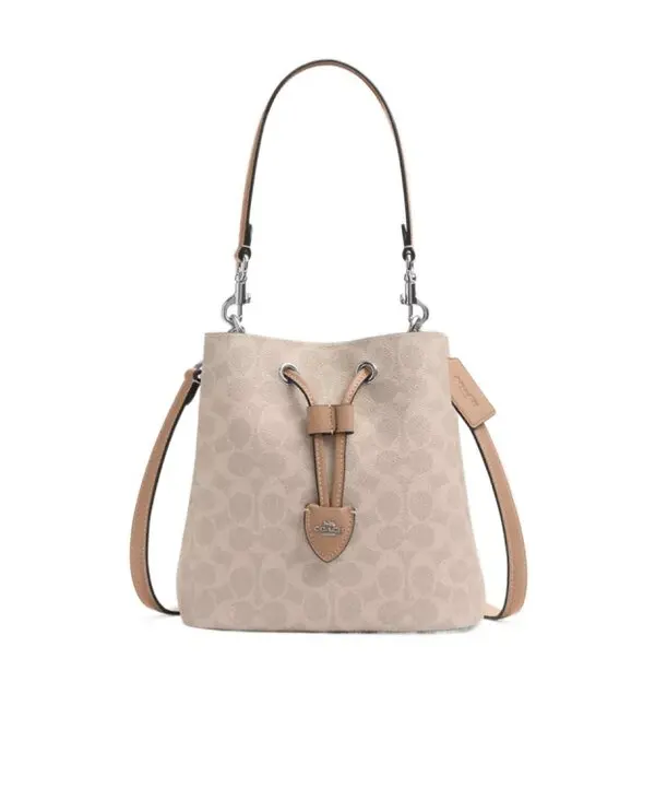 COACH Rowan Bucket Bag In Signature Canvas - Sv/sand/taupe