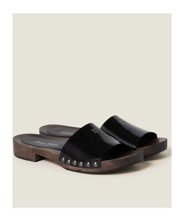 Miu Miu Patent Leather Clogs With Embossed Logo