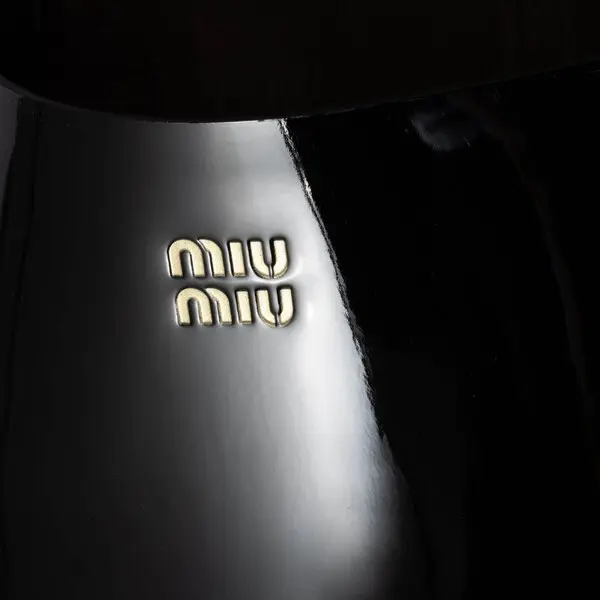 Miu Miu Patent Leather Clogs With Embossed Logo