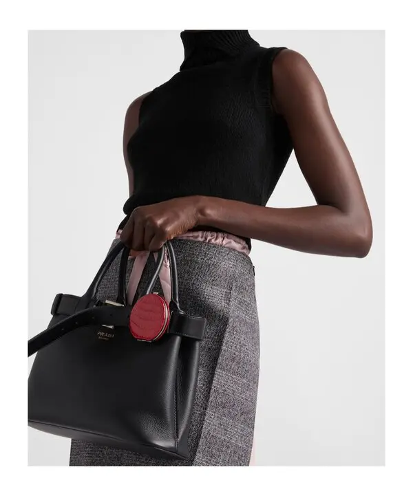 Prada Sleeveless Ribbed Knit Roll Neck Vest With Logo Detail