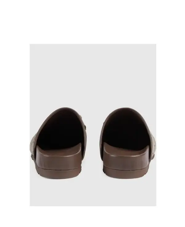 Gucci Monogrammed Gancini Plaque Slides - Nude