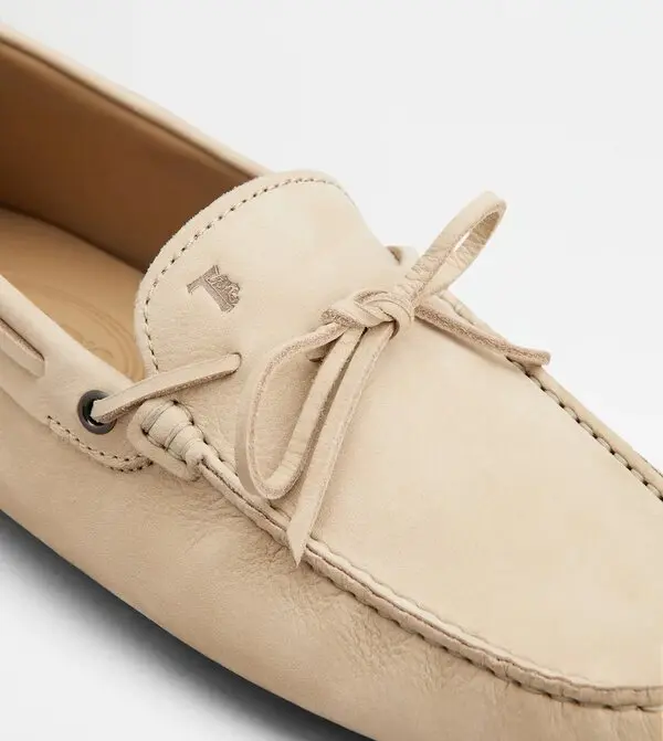 TOD'S Round Toe Slip-on Loafers With Tie Detailing - Beige