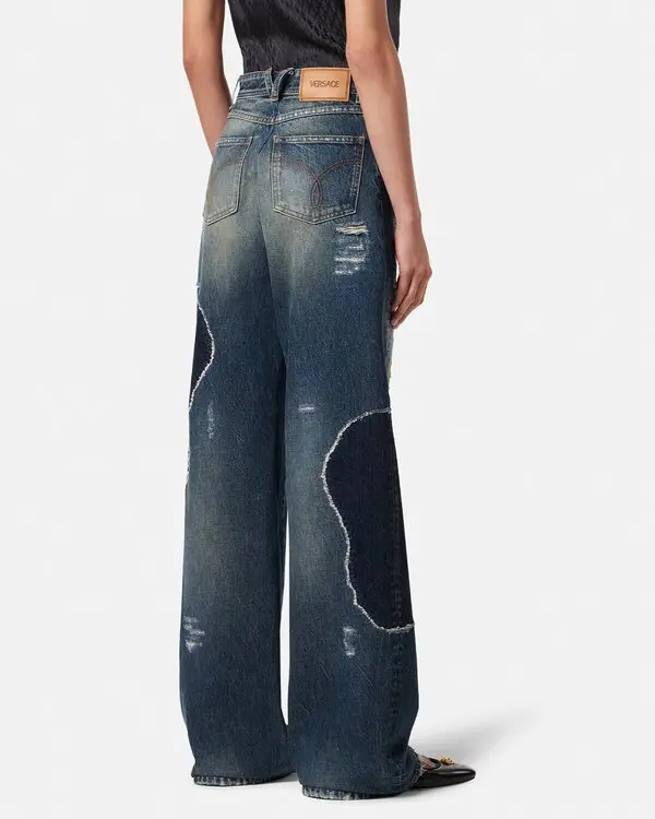 Versace Distressed Logo Patch Jeans