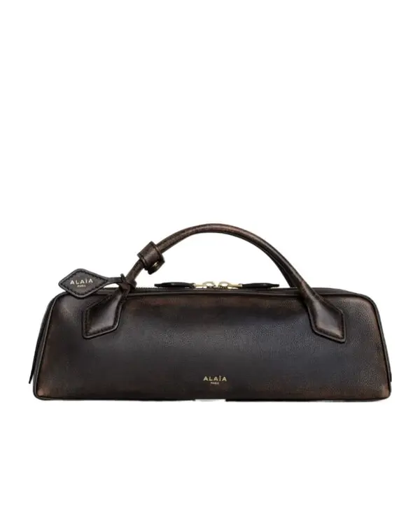 Alaïa Le Teckel Clutch In Aged Leather - Black