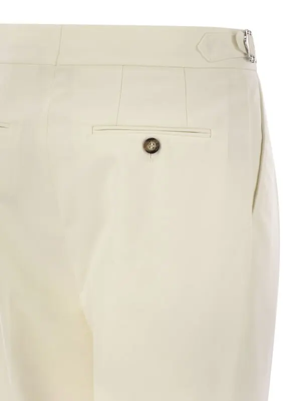 Brunello Cucinelli Pleated Tapered Trousers With Side Buckles - White
