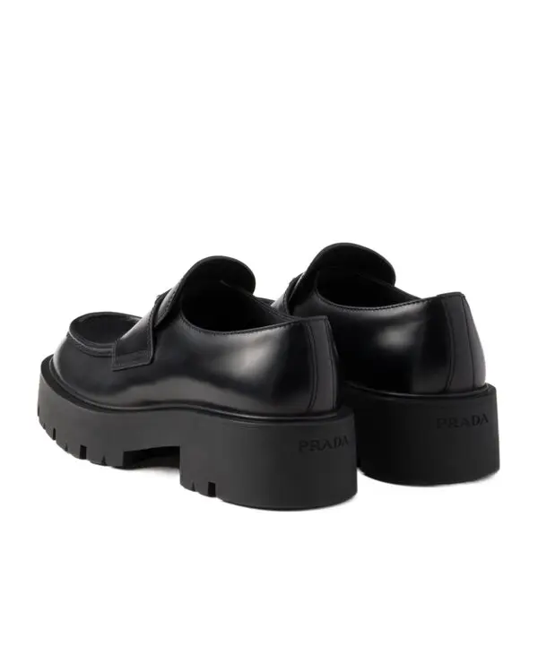 Prada Brushed Leather Loafers With Embossed Soles - Black