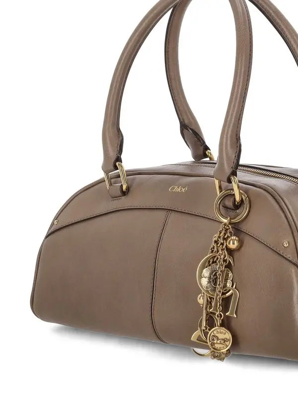 Chloé Zipped Bowling Hand Bag With Logo Charms - Gray