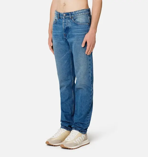 AMI Paris Logo Patch Tapered-leg Jeans - Blue