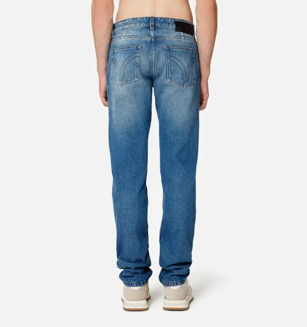 AMI Paris Logo Patch Tapered-leg Jeans - Blue
