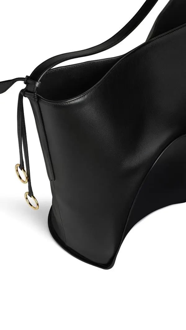 Alaïa Leather Bucket Bag With Metal Charms