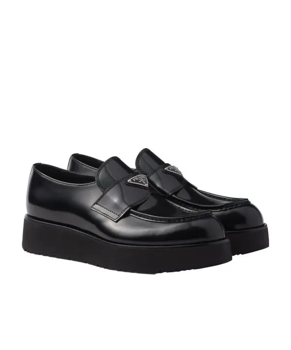 Prada Brushed Leather Loafers With Enameled Metal Logo