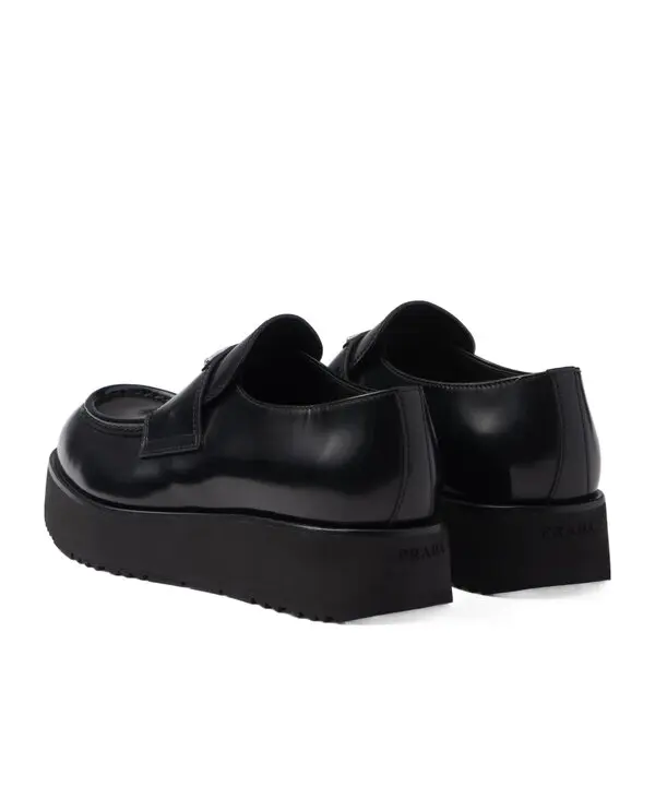 Prada Brushed Leather Loafers With Enameled Metal Logo
