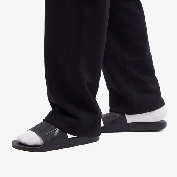 Valentino Garavani Vltn Logo Embossed Slip-on Slides