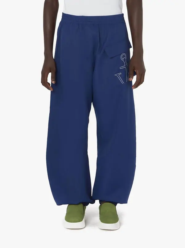 J.W.ANDERSON Jw Anderson Anchor Logo Printed Twisted Joggers