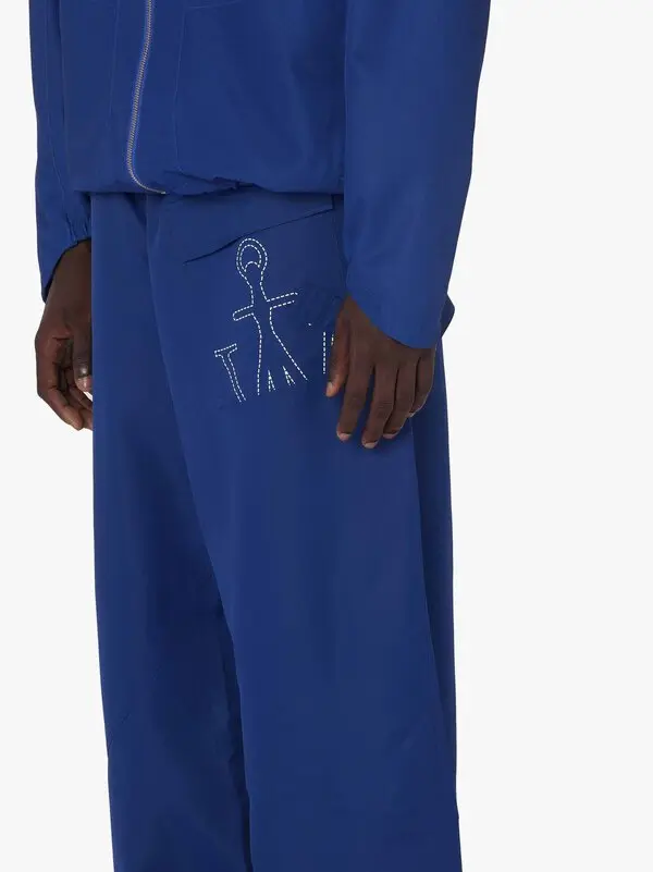 J.W.ANDERSON Jw Anderson Anchor Logo Printed Twisted Joggers