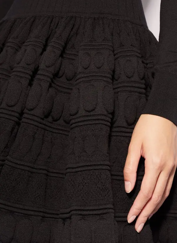 Alaïa Long-sleeved Wool Dress With Round Neck And Pleated Skirt
