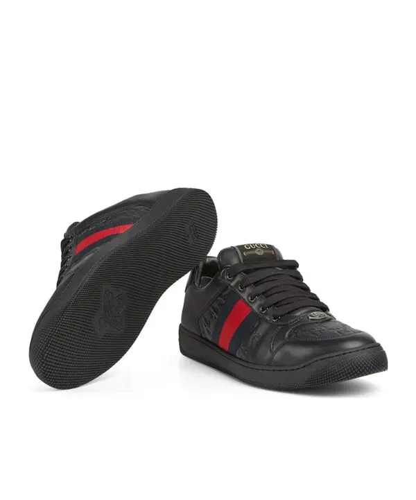Gucci Embossed Gg Leather Low-top Sneakers - Black
